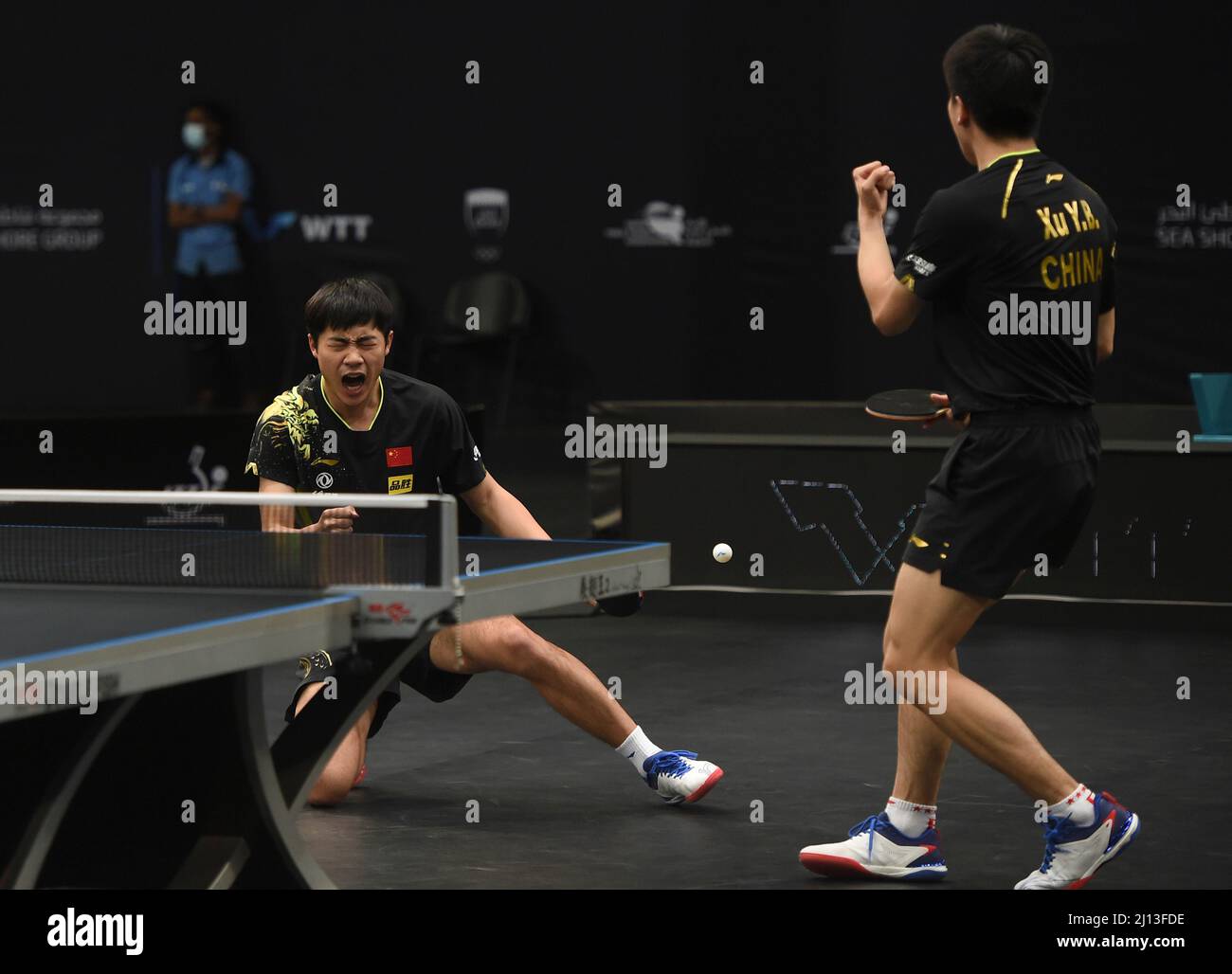 Doha, Qatar. 22nd Mar, 2022. Cao Wei (L)/Xu Yingbin of China celebrate ...