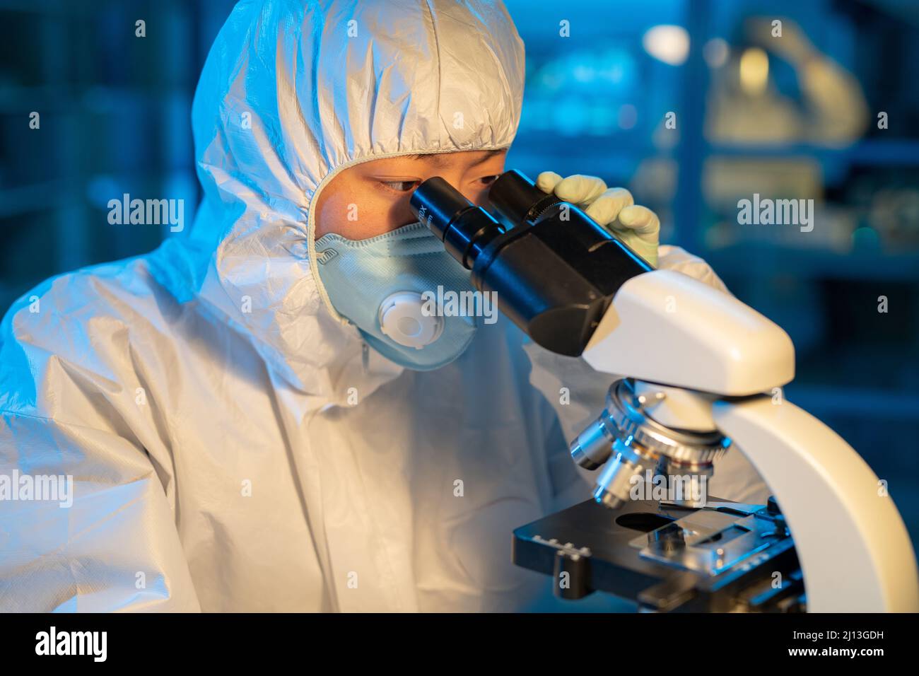 Female researcher in protective suit hi-res stock photography and ...
