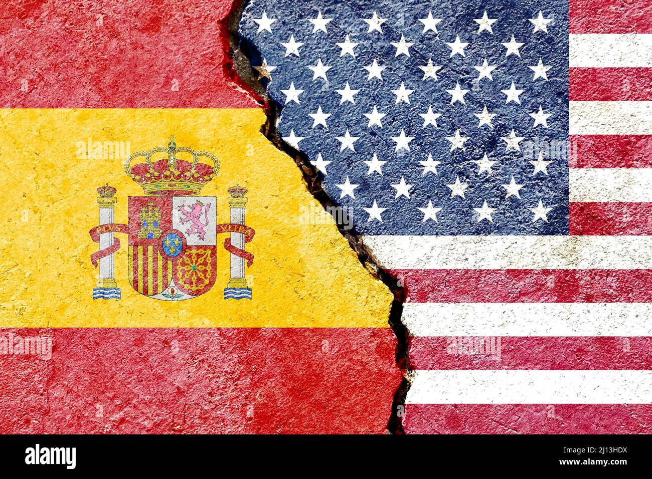 Spain vs USA national flags isolated on cracked dirty wall background ...