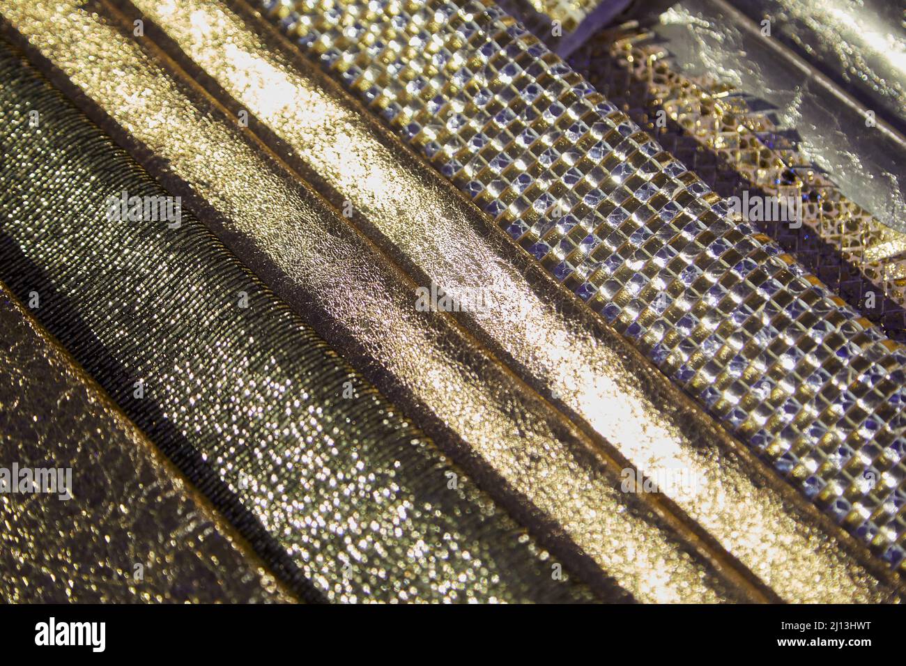 Golden and metallic tooled leather samples texture background Stock ...