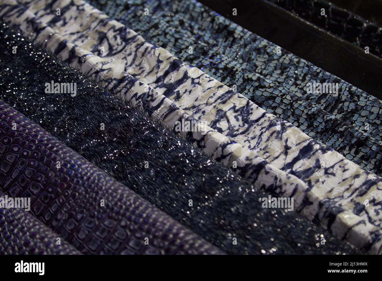 Reptile leather samples in dark and mottled colors texture background ...