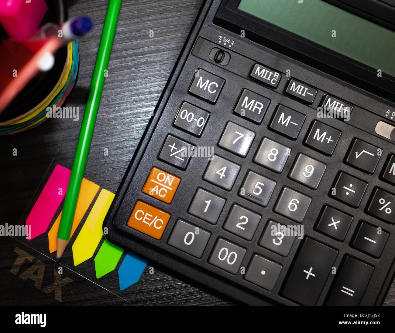 Magnifying glass on calculator hi-res stock photography and images - Alamy