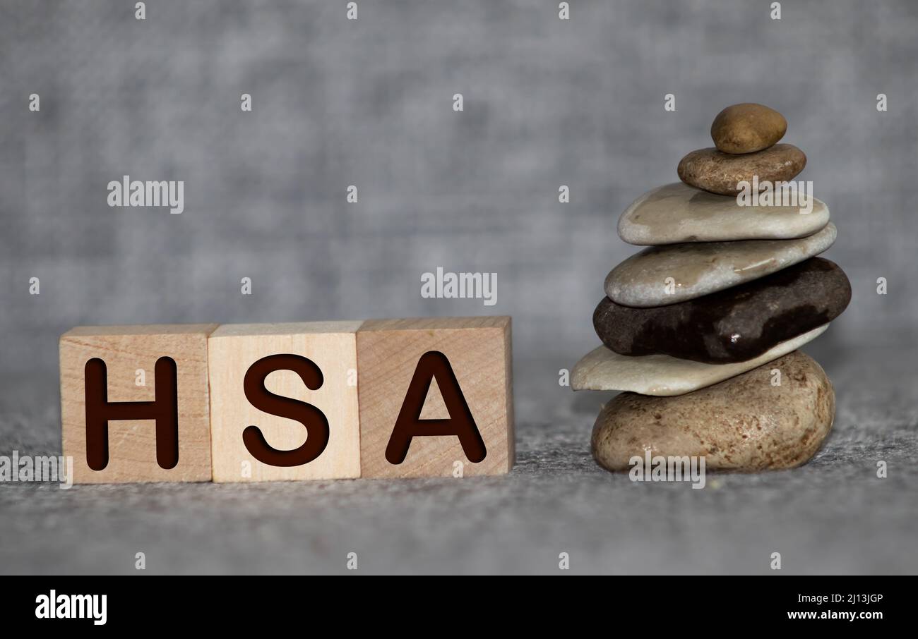 Health Savings Account HSA letters from wooden blocks Stock Photo - Alamy