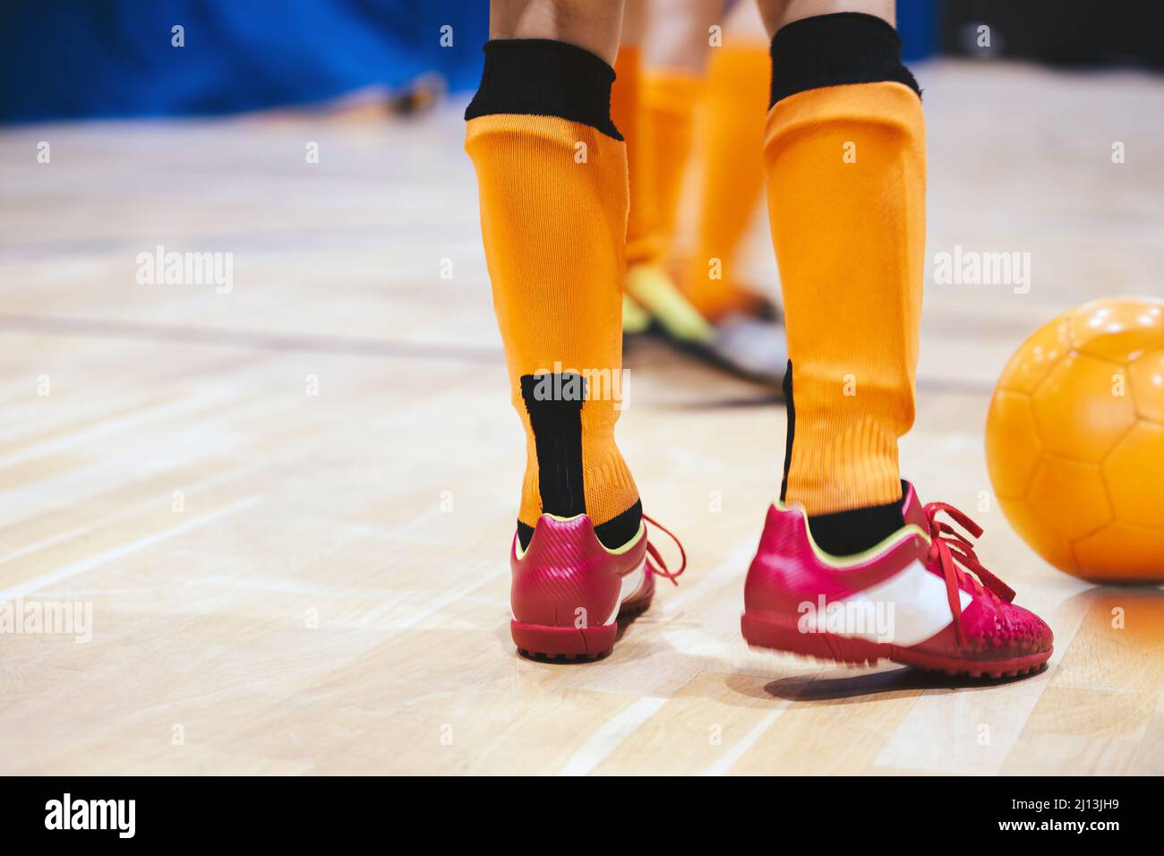 Indoor futsal soccer players playing futsal match. Indoor soccer sports ...