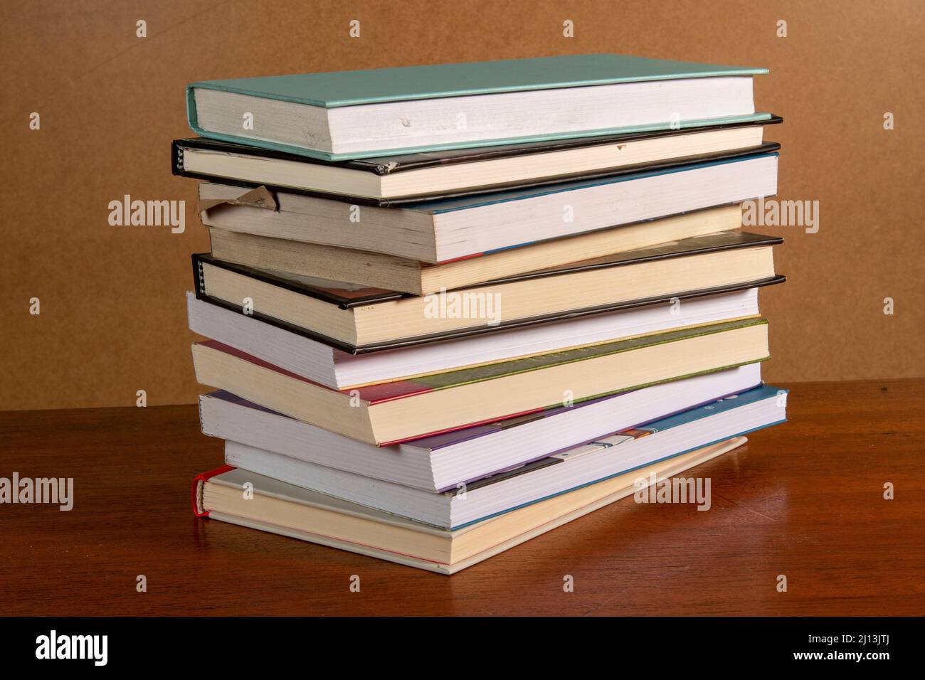 Close-up of background stack of old used books. Pile of vintage old ...