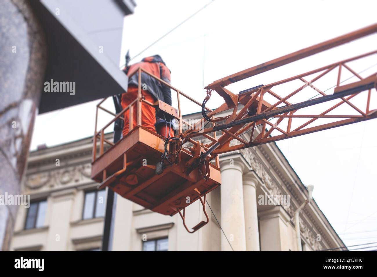 Aerial work platform vehicle during facade decoration setting new road ...