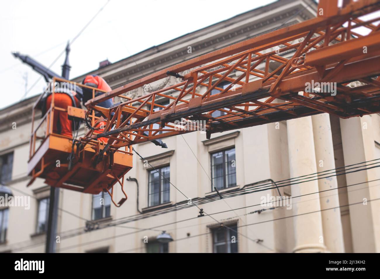 Aerial work platform vehicle during facade decoration setting new road ...