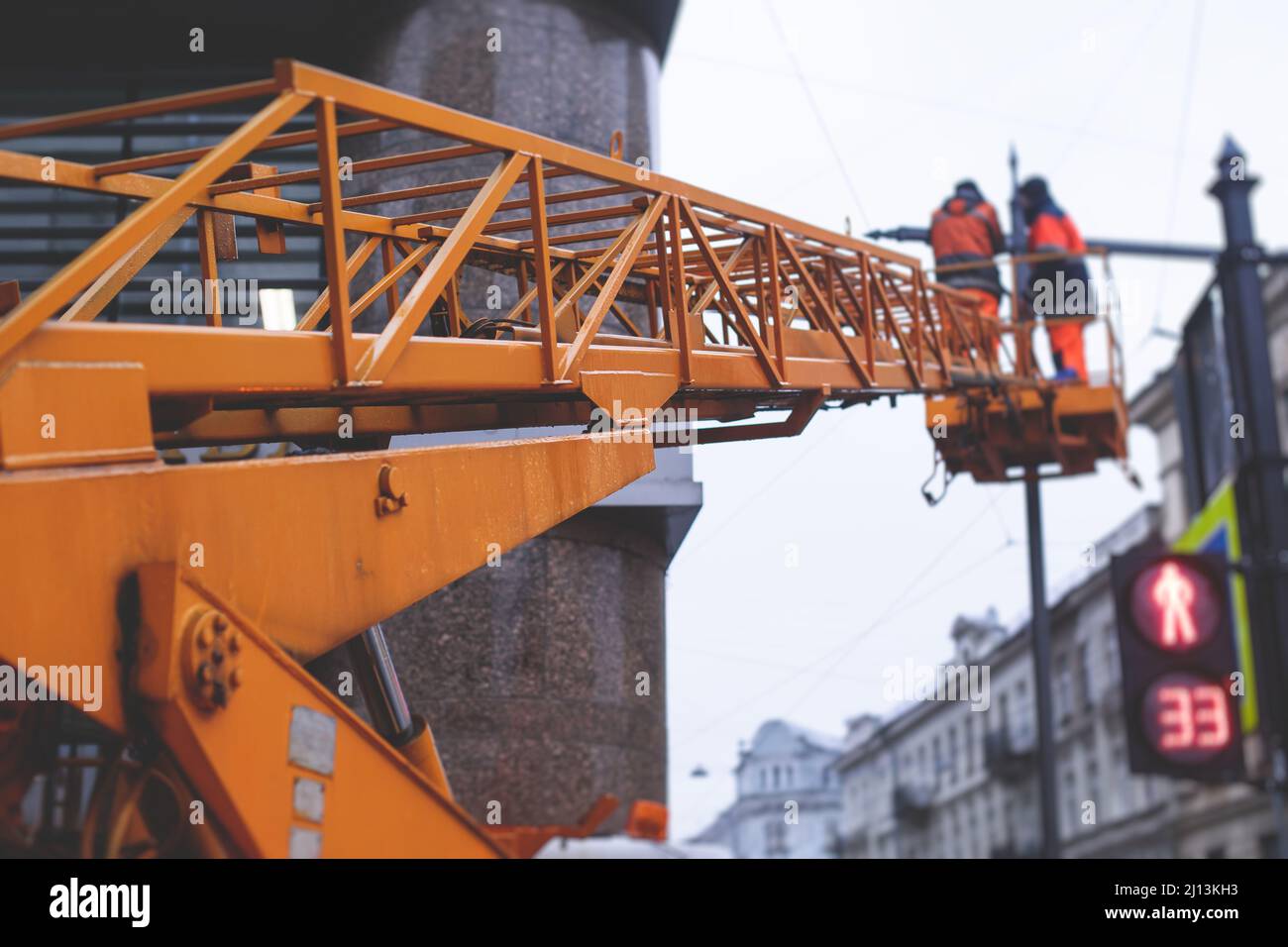 Aerial work platform vehicle during facade decoration setting new road ...