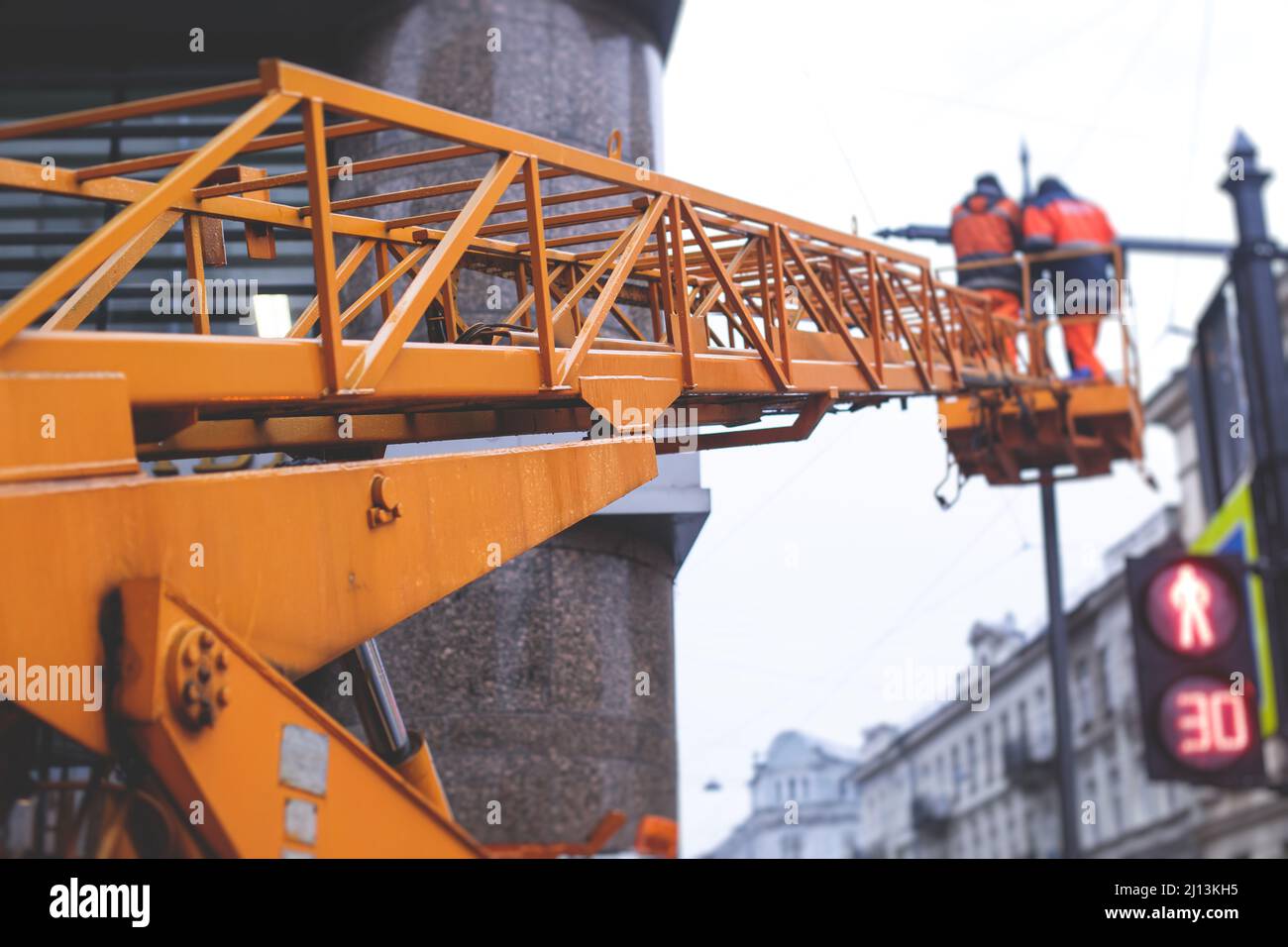 Aerial work platform vehicle during facade decoration setting new road ...