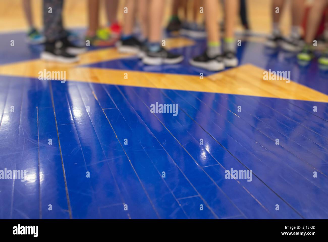 View of basketball court hall indoor venue with junior teenage school ...