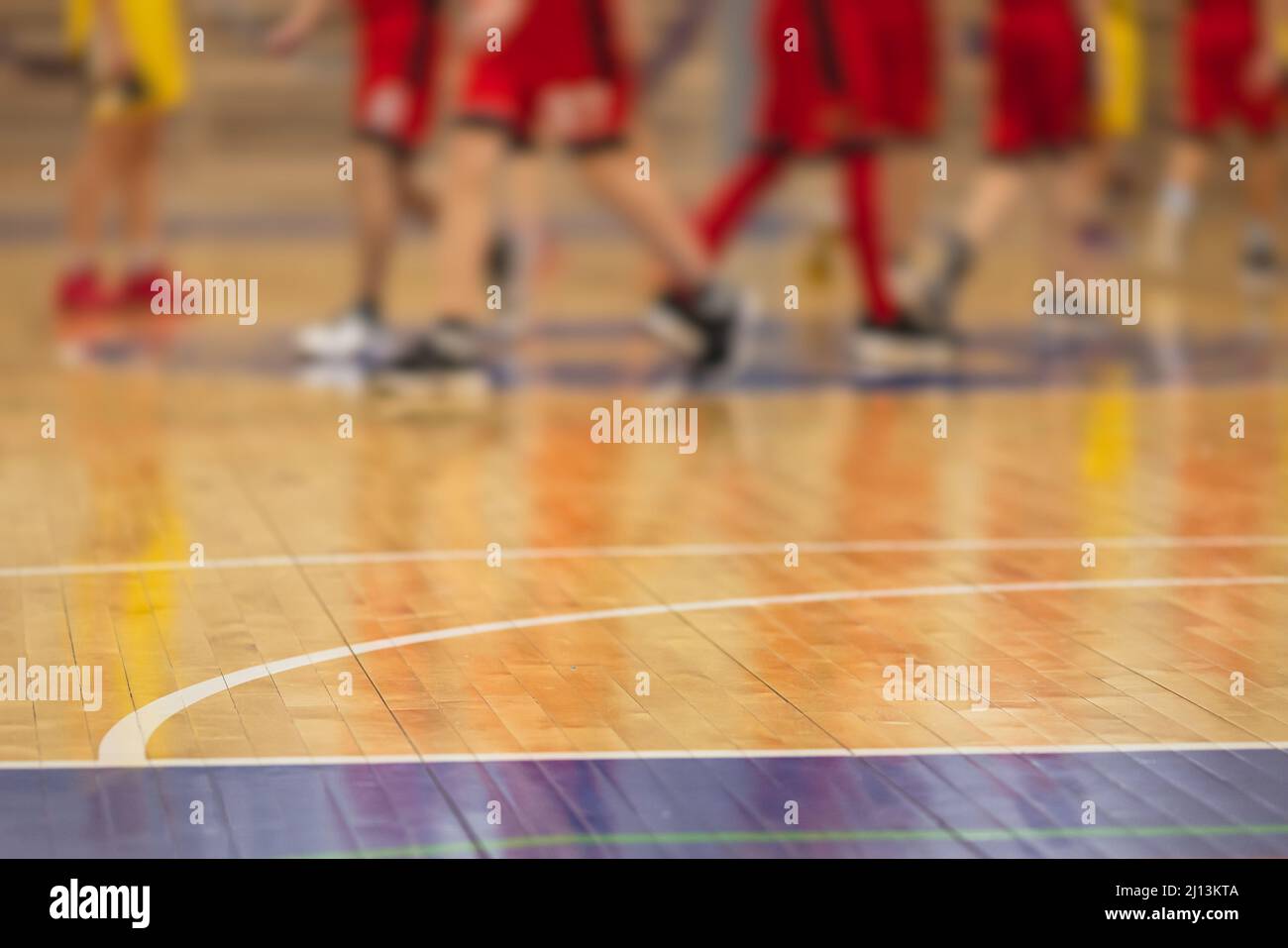 View of basketball court hall indoor venue with junior teenage school ...
