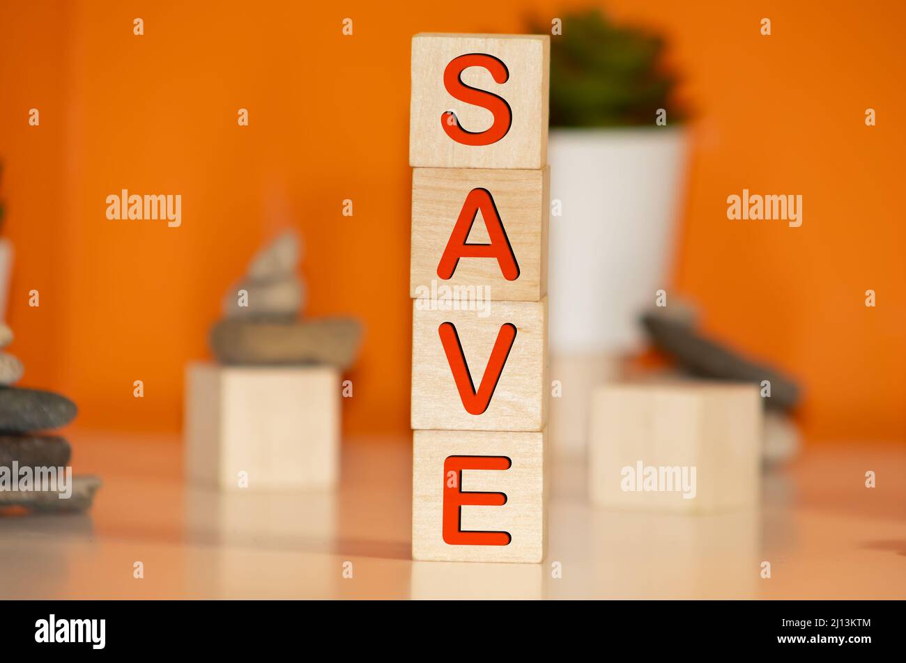 SAVE word written on wood block. Wooden abc Stock Photo - Alamy