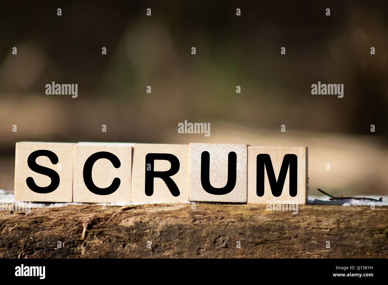 SCRUM text on a wooden background, business concept Stock Photo - Alamy