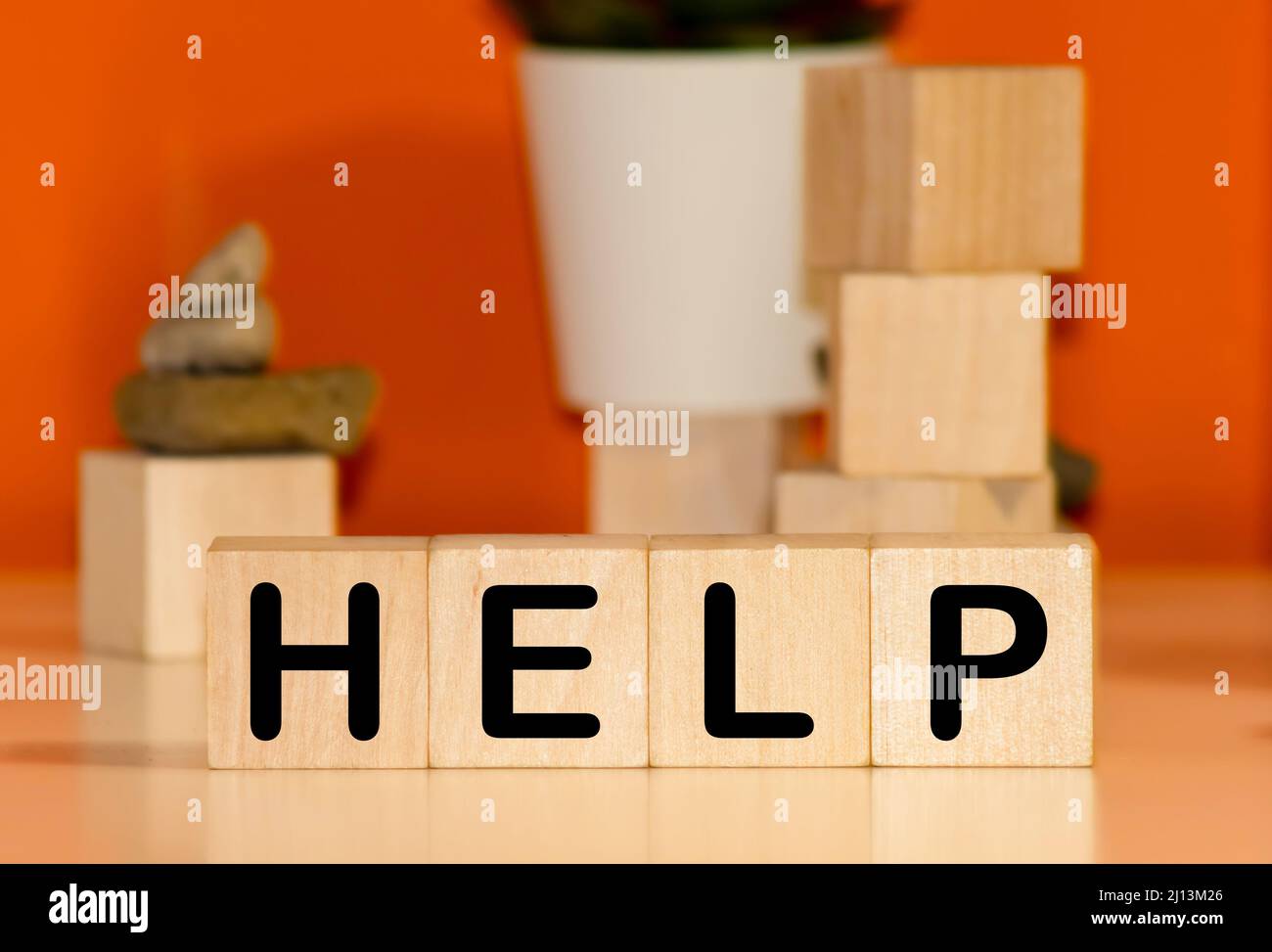 HELP word written on wood blocks, white background with copyspace Stock ...