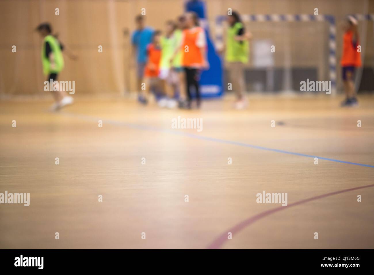 View of basketball court hall indoor venue with junior teenage school ...