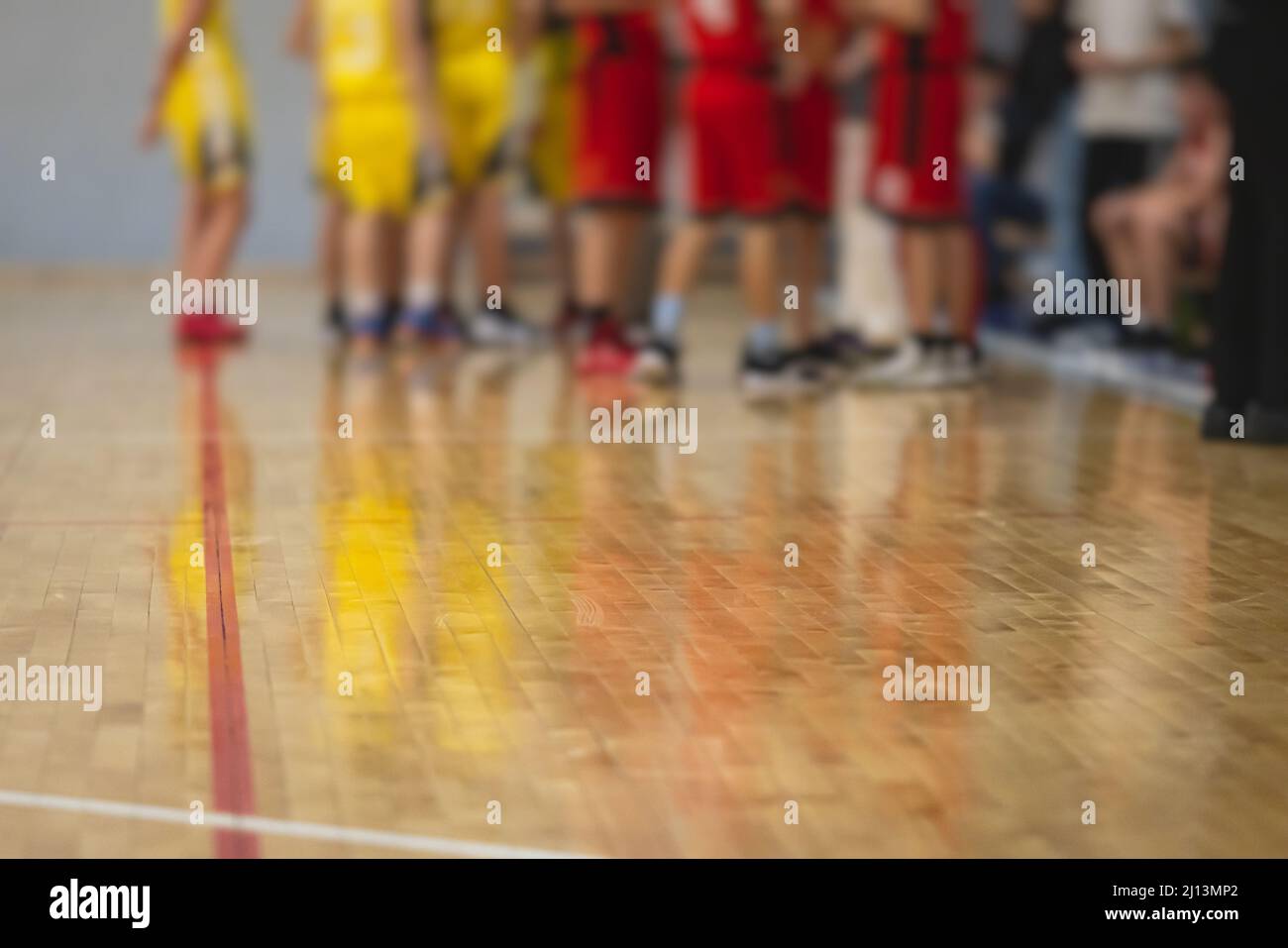 View of basketball court hall indoor venue with junior teenage school ...