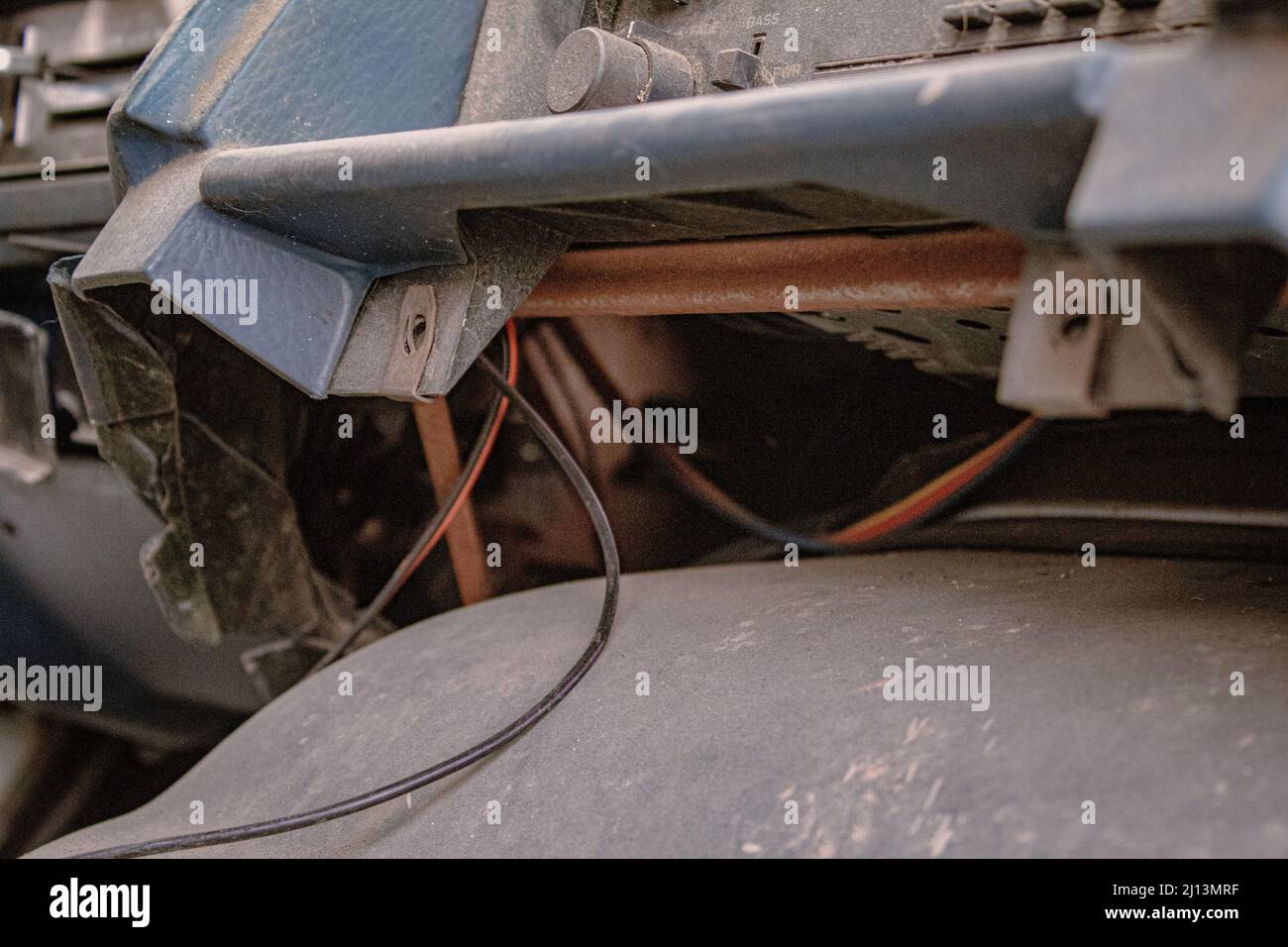 Close up of wires hanging out of a vintage radio in an old car Stock ...