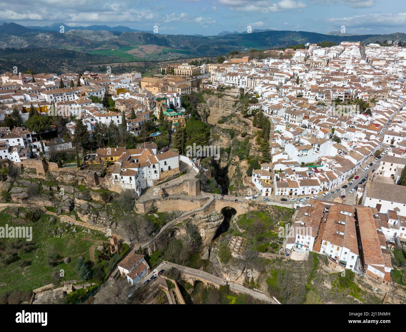 view of the monumental town of Ronda and its ancient city walls, Spain ...