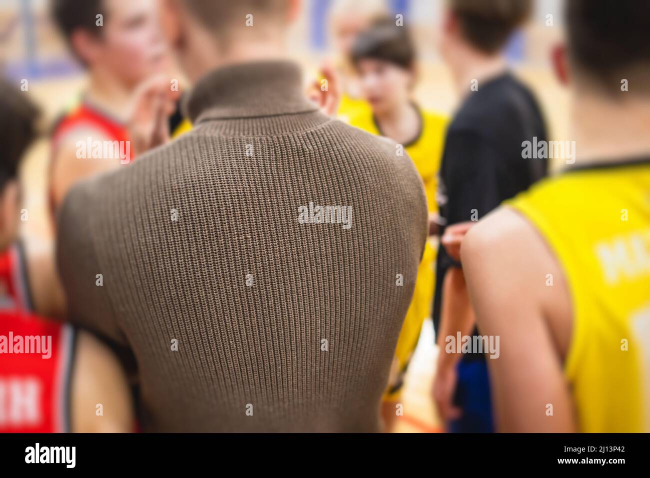Junior young basketball team with a coach, group of kids children team ...
