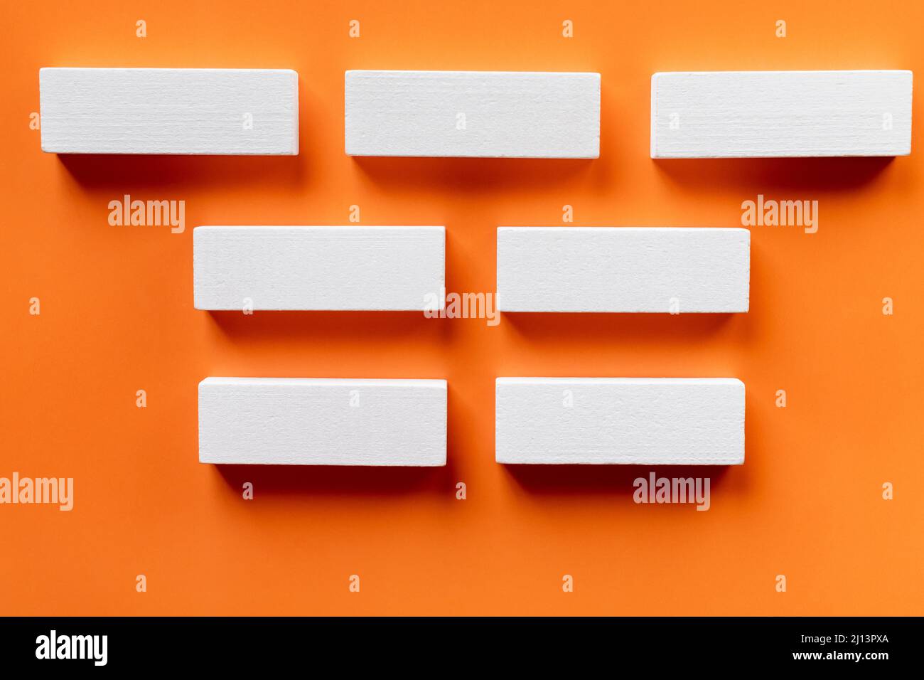 top view of white blocks horizontal lines on orange background Stock ...