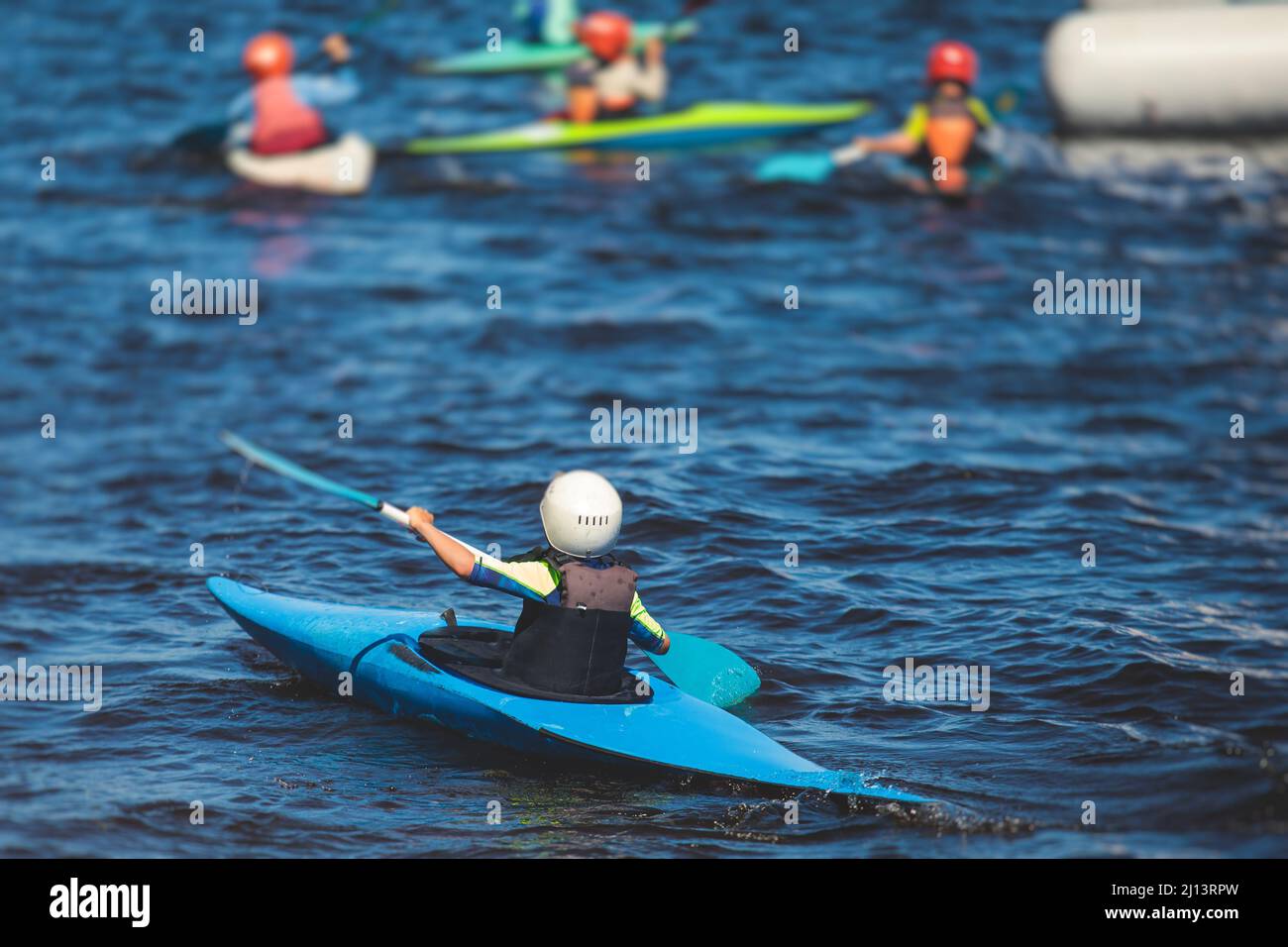 Kids learn kayaking, canoeing whitewater training in the lake river ...