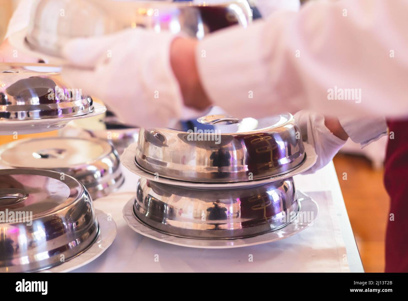 Process of serving luxury dinner in a cloche plate dish with a lid ...