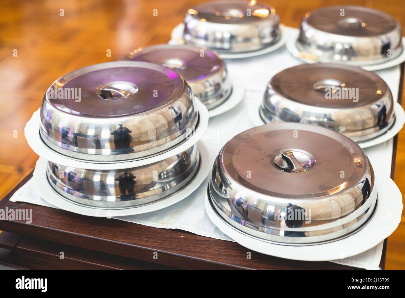 Process of serving luxury dinner in a cloche plate dish with a lid ...