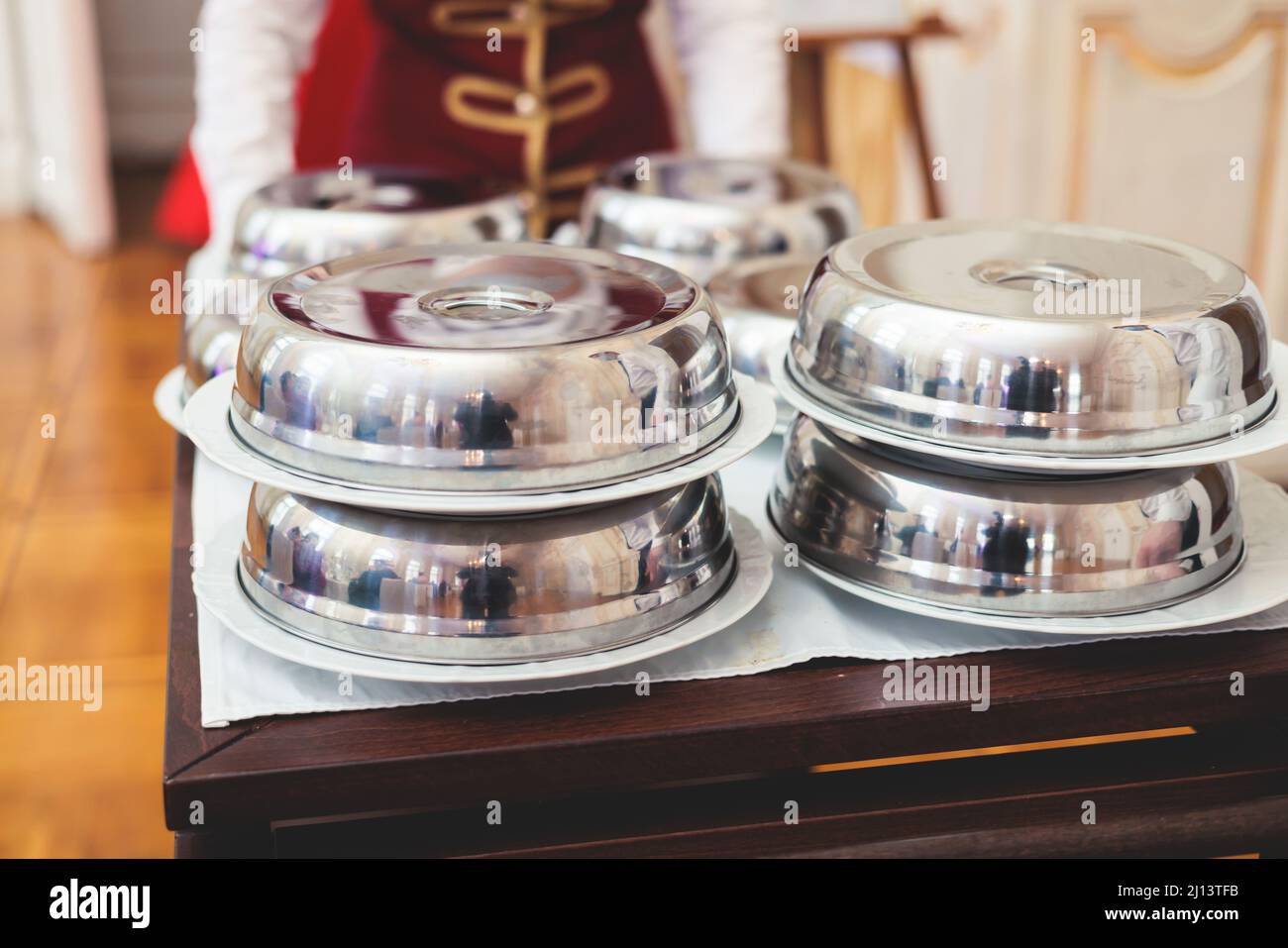 Process of serving luxury dinner in a cloche plate dish with a lid ...