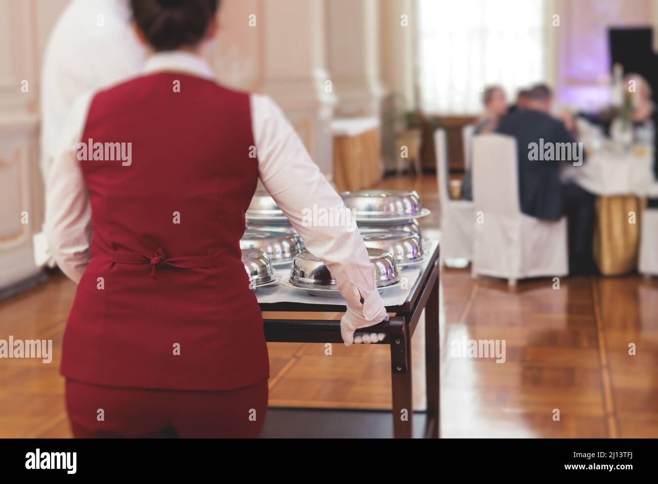 Process of serving luxury dinner in a cloche plate dish with a lid ...