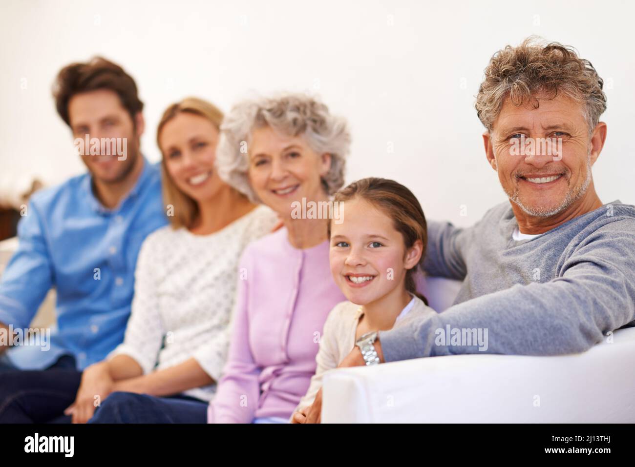 Three generations of love. Portrait of a cheerful multi generational ...
