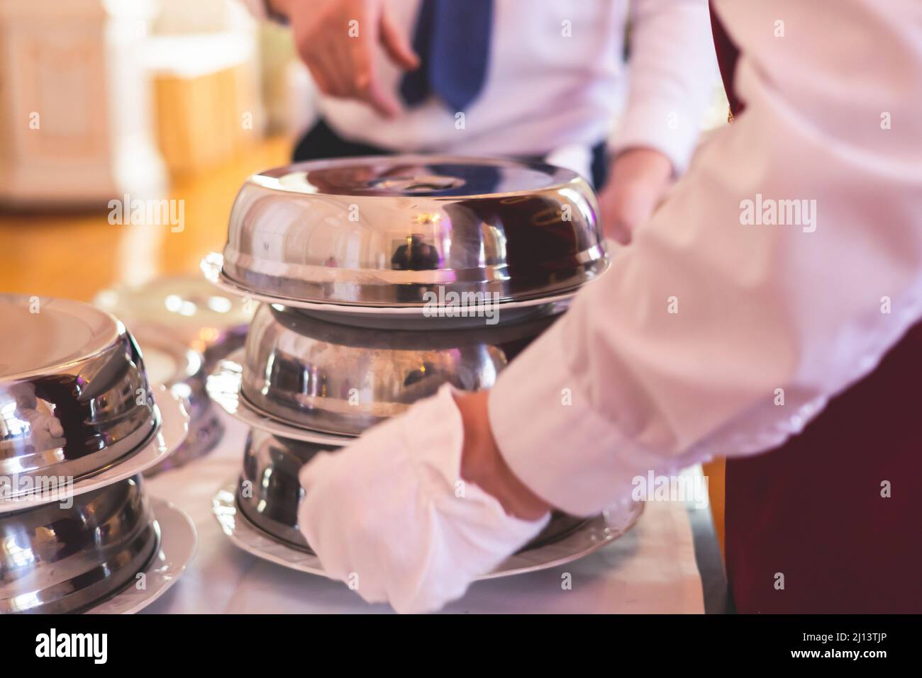 Process of serving luxury dinner in a cloche plate dish with a lid ...