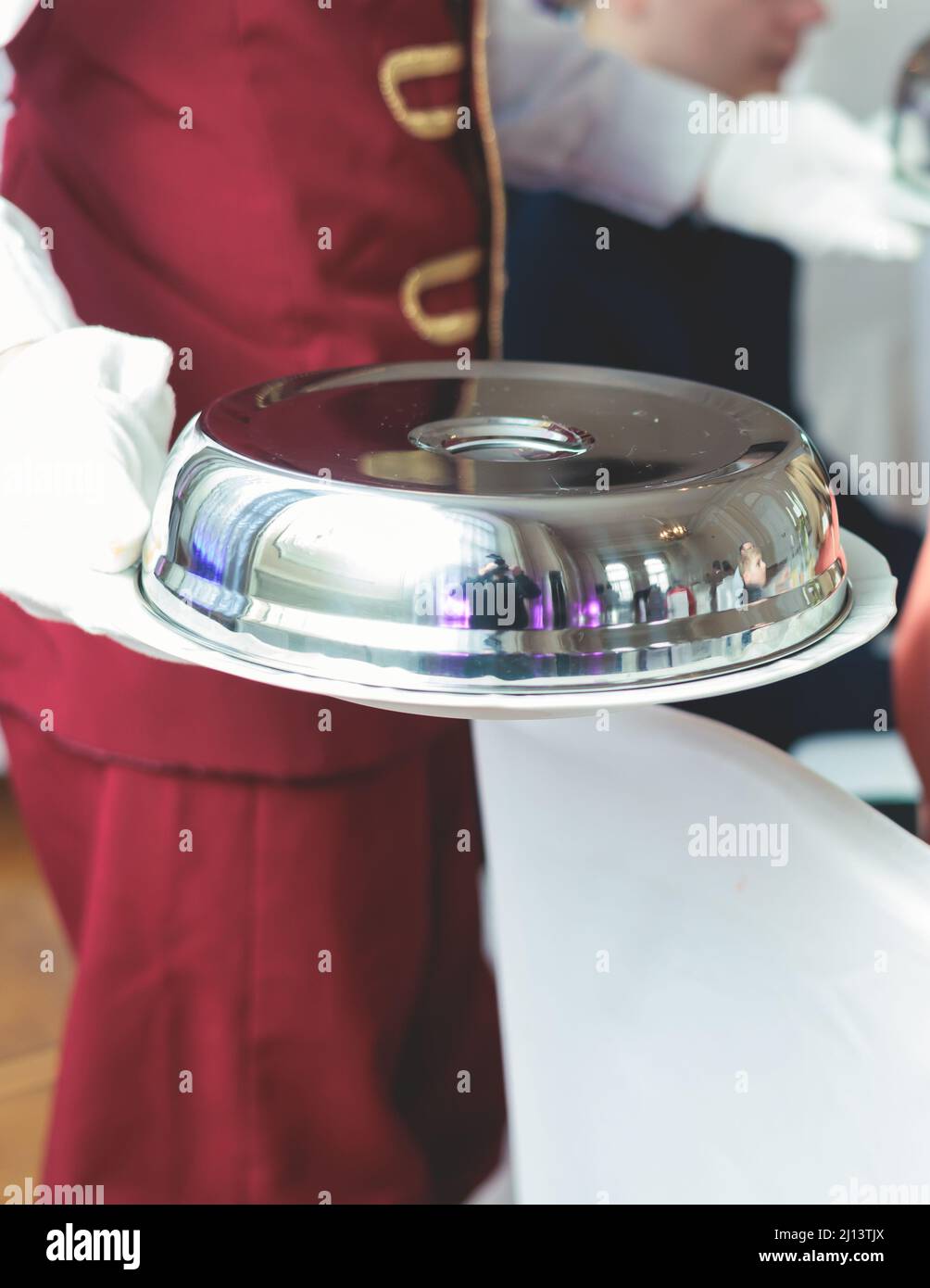 Process of serving luxury dinner in a cloche plate dish with a lid ...
