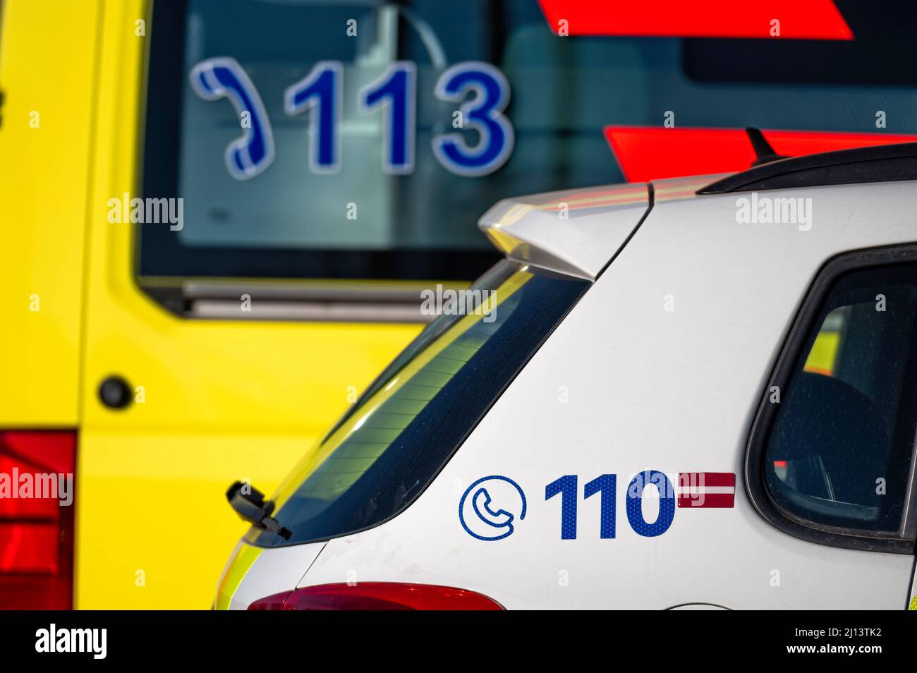 close-up of stencilled police and ambulance cars, 112 and 113 emergency ...
