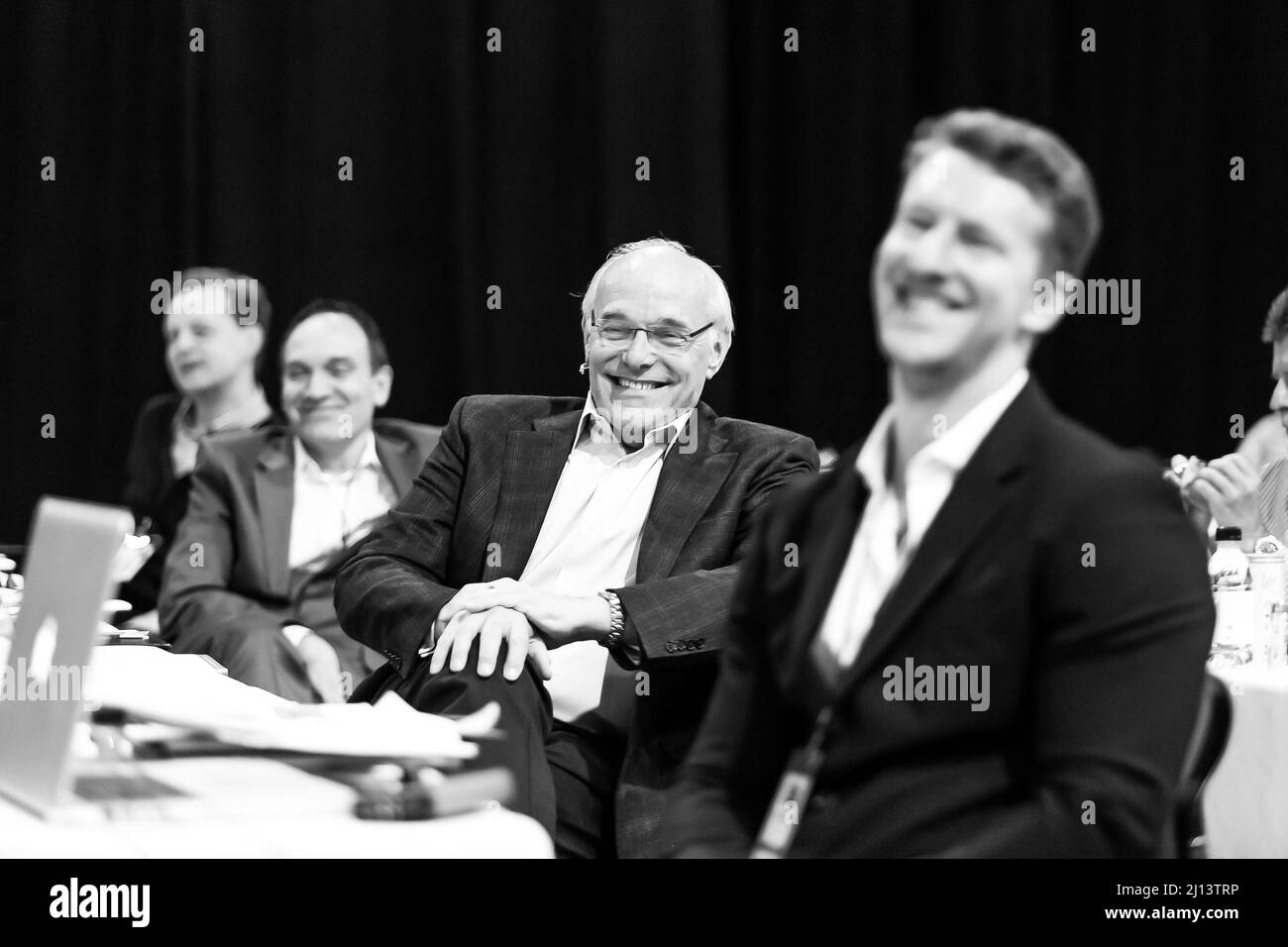 Delegates attending a sales convention in large conference hall Stock ...