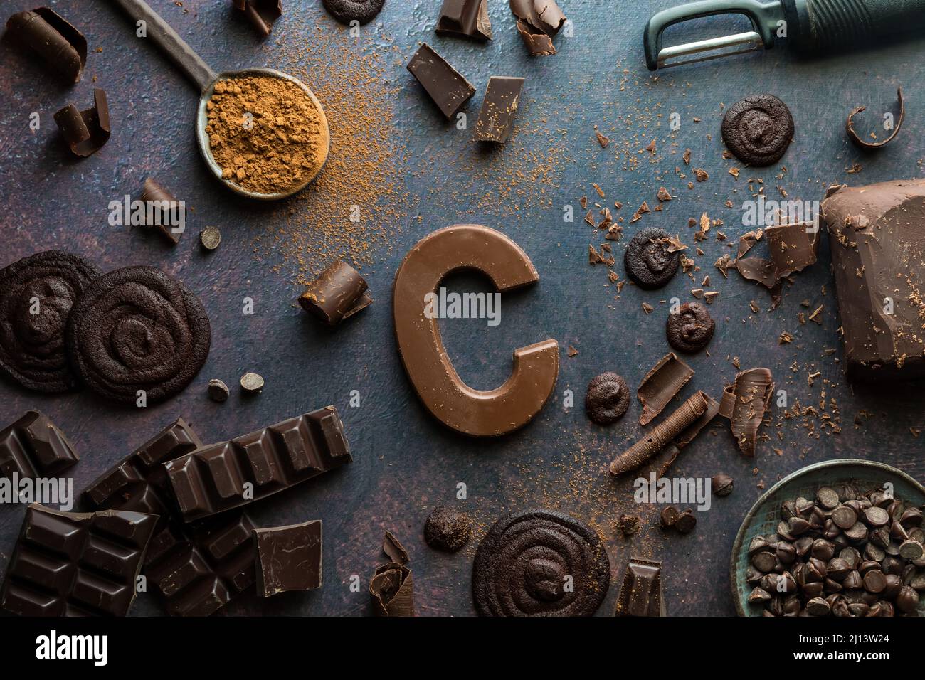 An assortment of chocolate with a chocolate letter C in the middle ...
