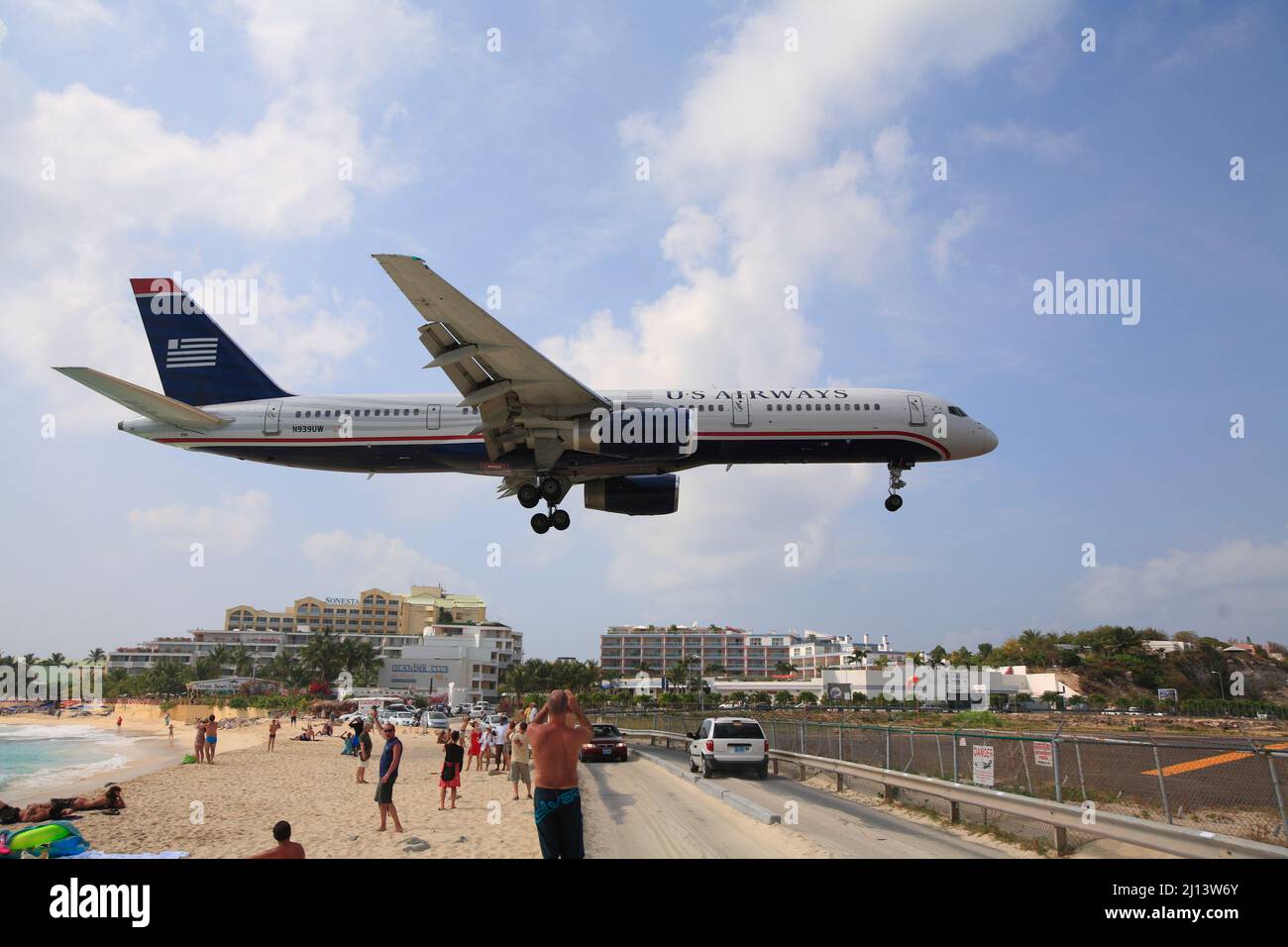 Airplane landing in St Martin Caribbean island Stock Photo - Alamy