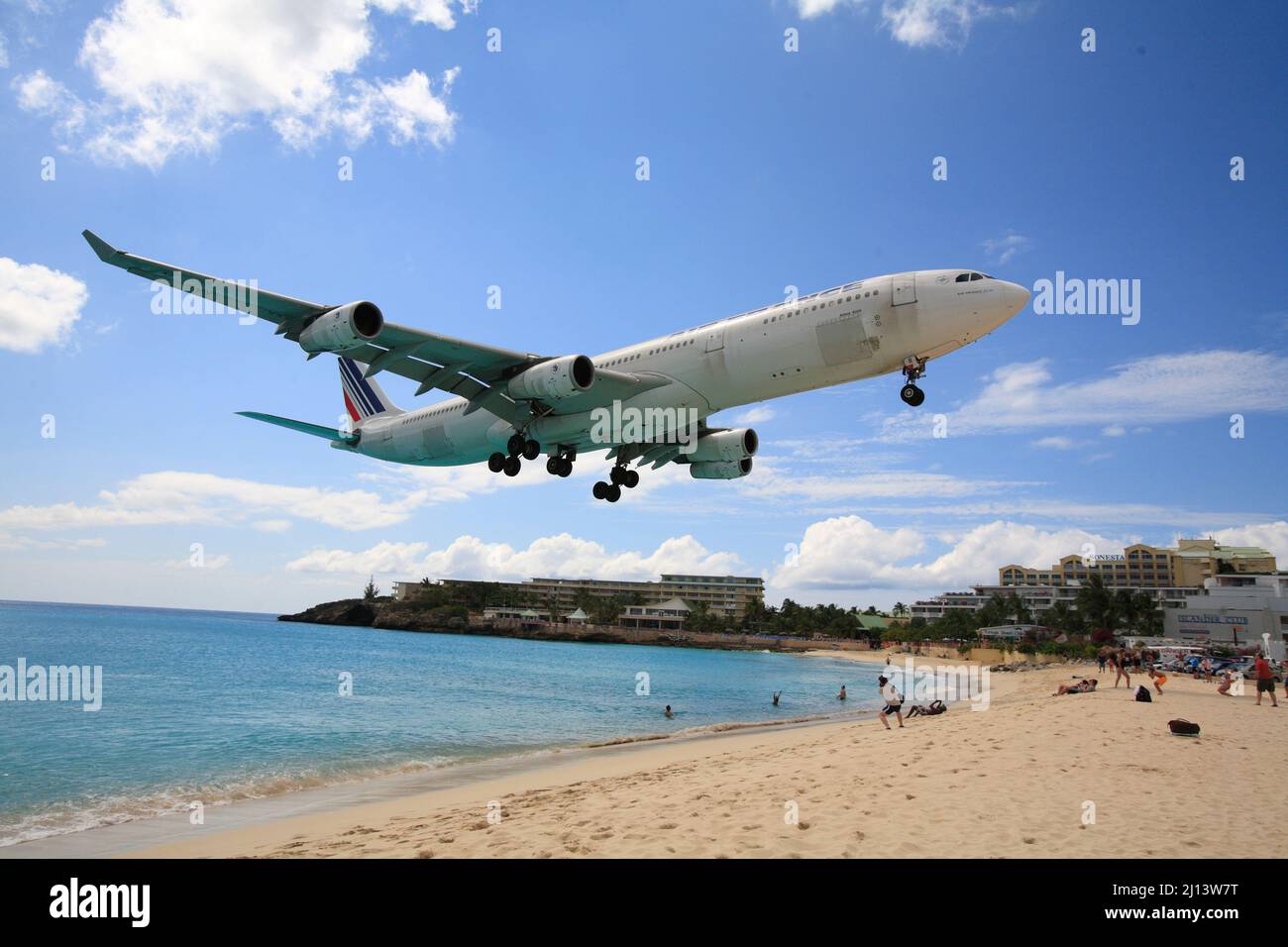 Airplane landing in St Martin Caribbean island Stock Photo - Alamy
