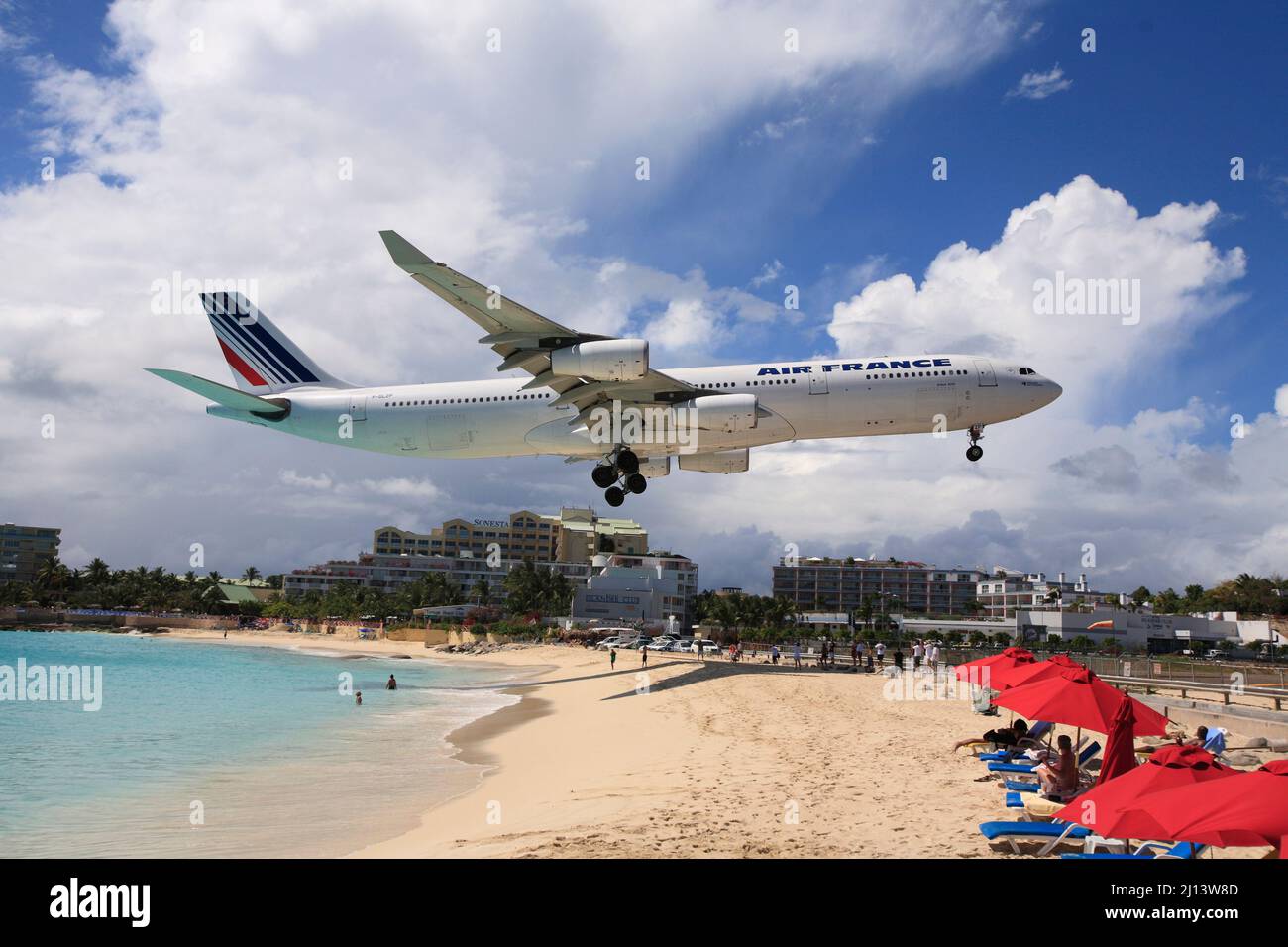 Airplane landing in St Martin Caribbean island Stock Photo - Alamy