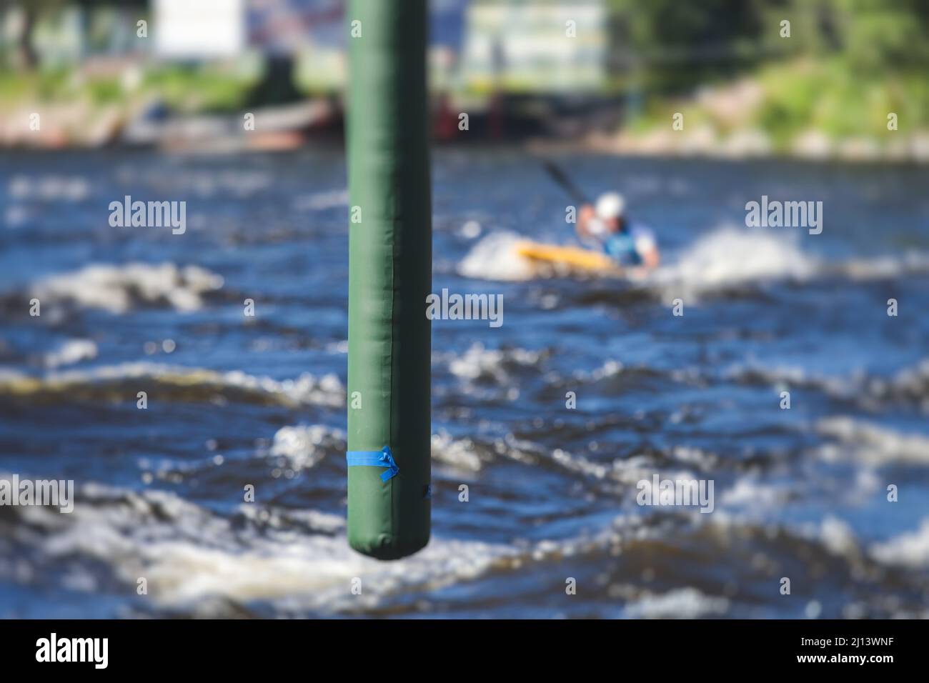 Kayak slalom canoe race in white water rapid river, process of kayaking ...