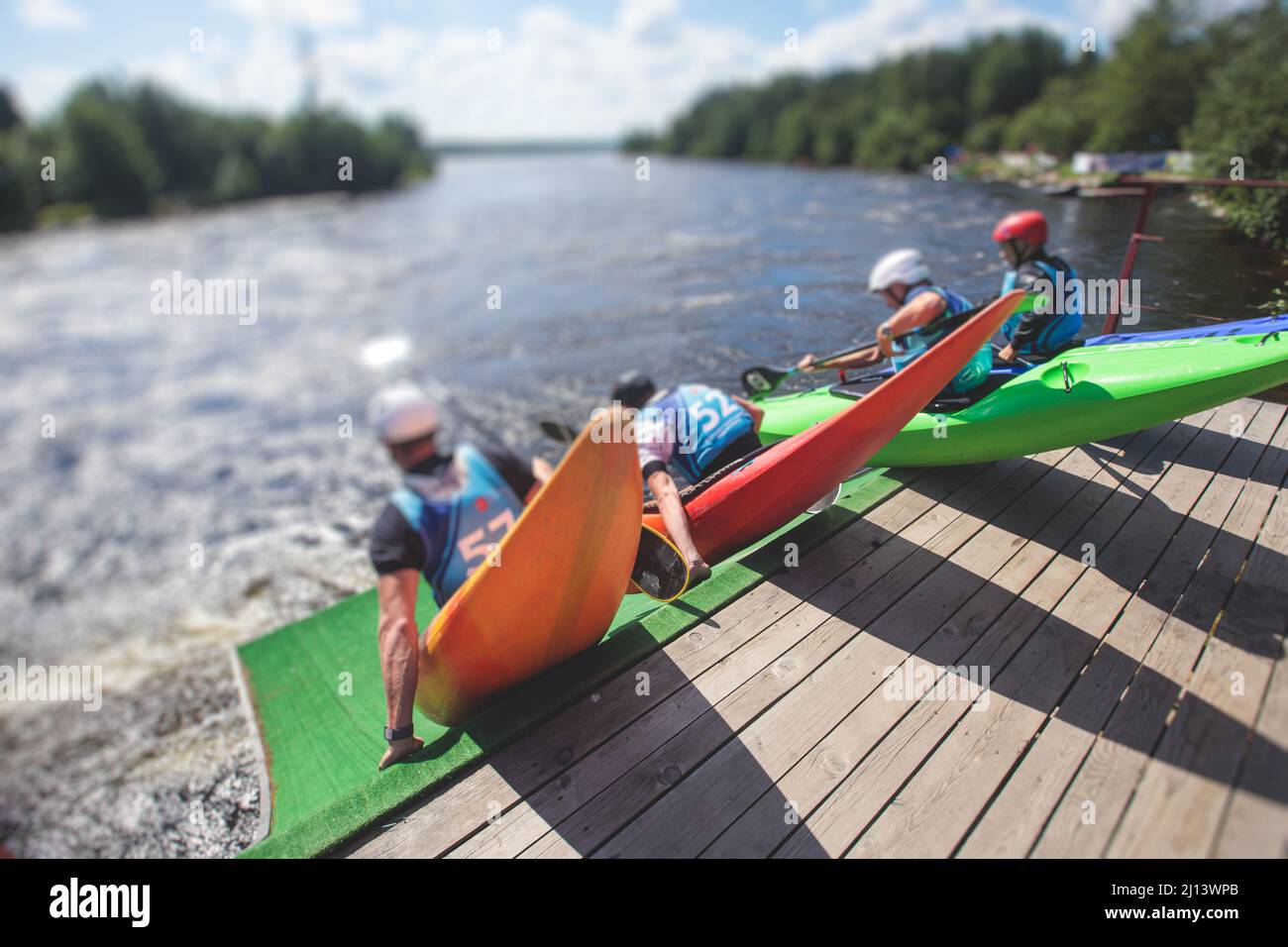 Kayak slalom canoe race in white water rapid river, process of kayaking ...