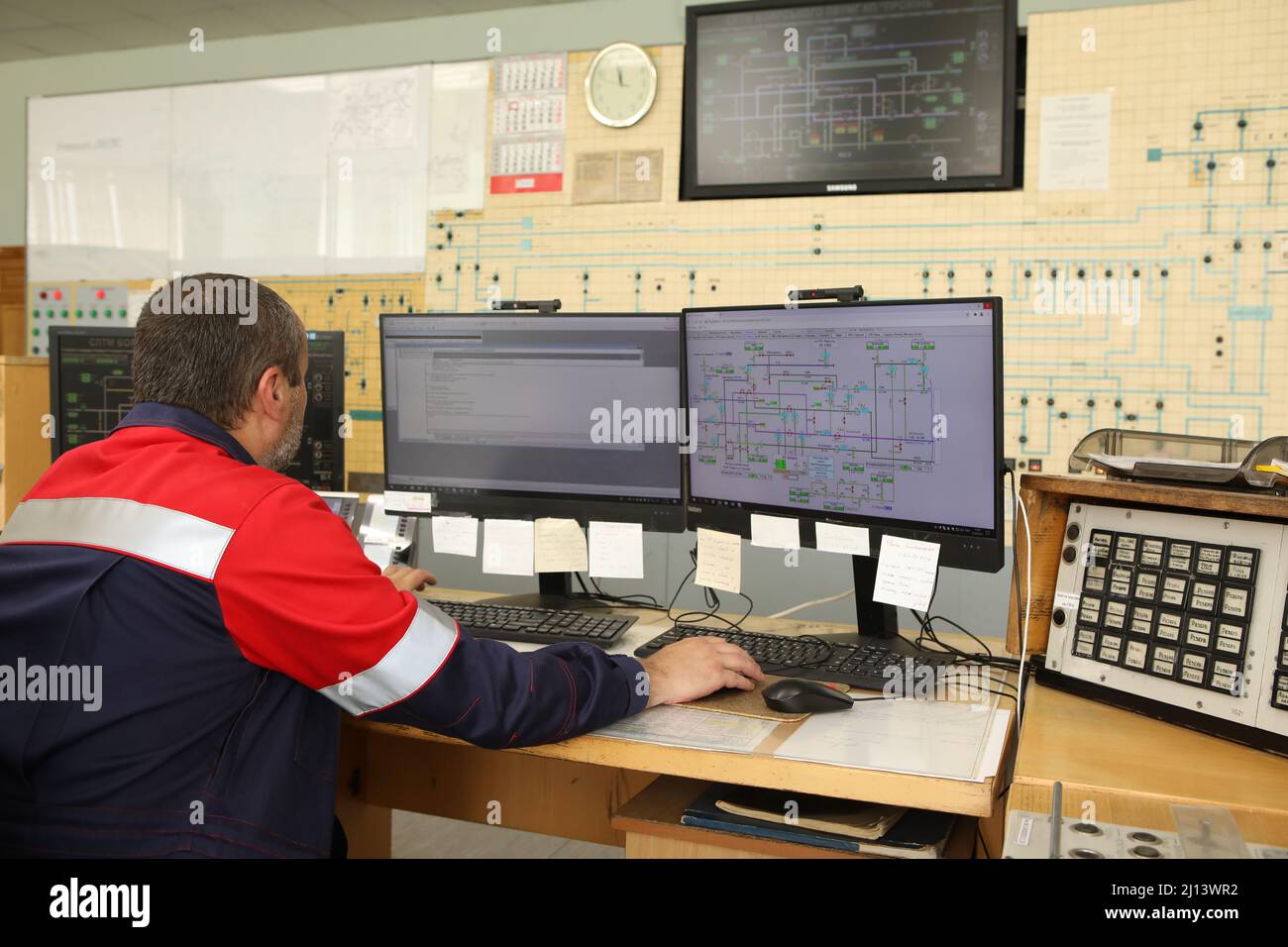 Workers at the oil and gas station. Shut off the gas, control station ...