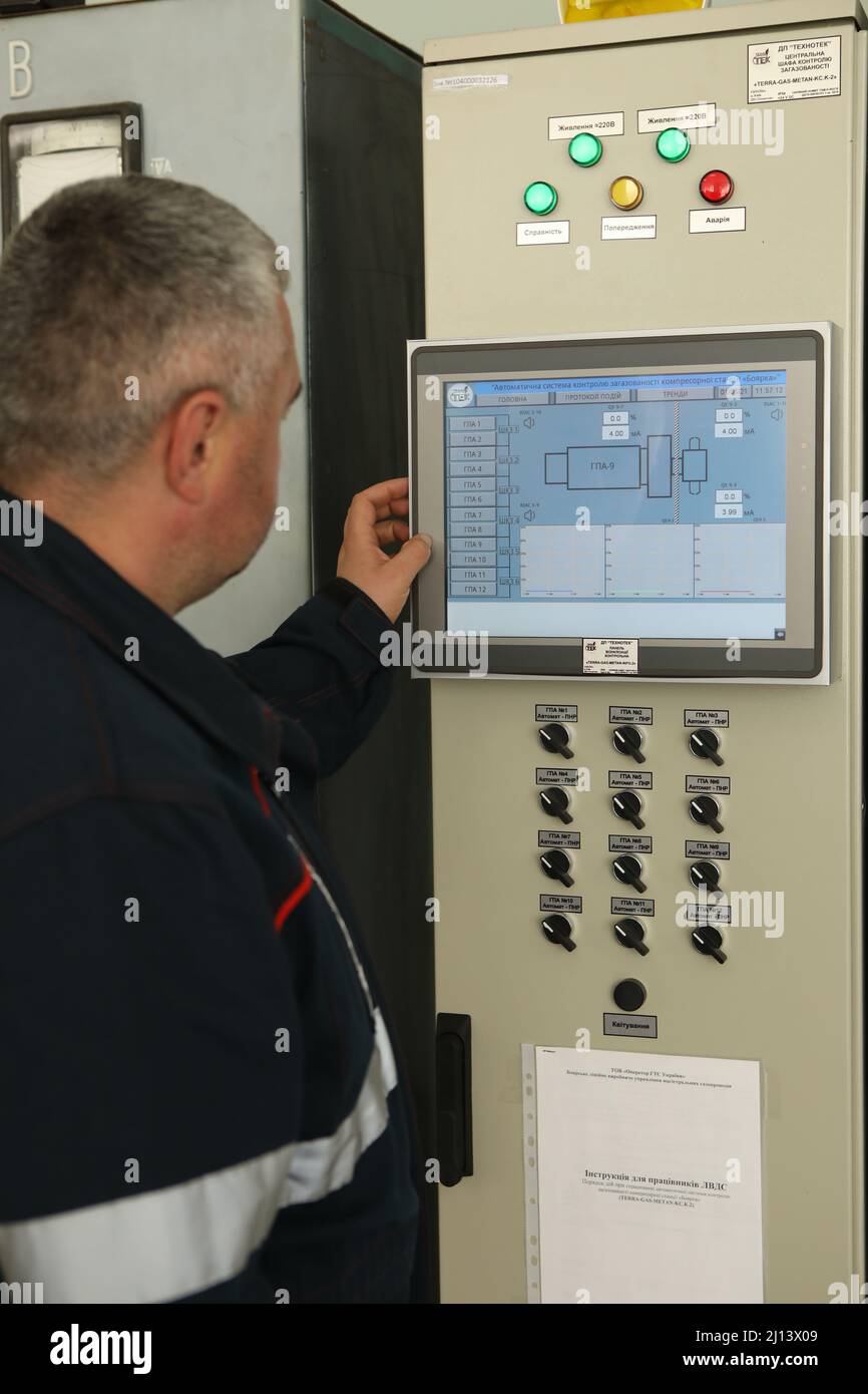 Workers at the oil and gas station. Shut off the gas, control station ...