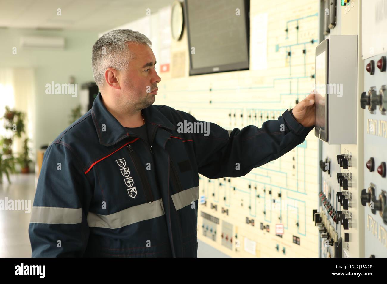 Workers at the oil and gas station. Shut off the gas, control station ...