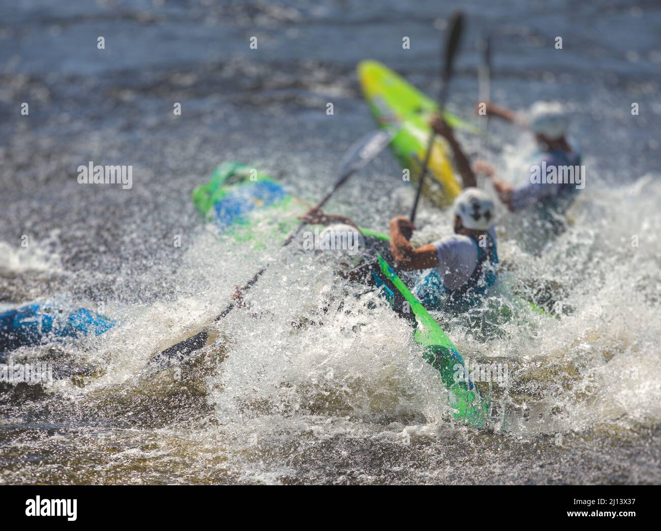 Kayak slalom canoe race in white water rapid river, process of kayaking ...