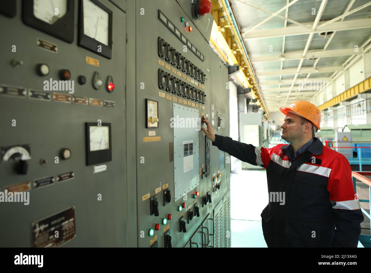 Workers at the oil and gas station. Shut off the gas, control station ...