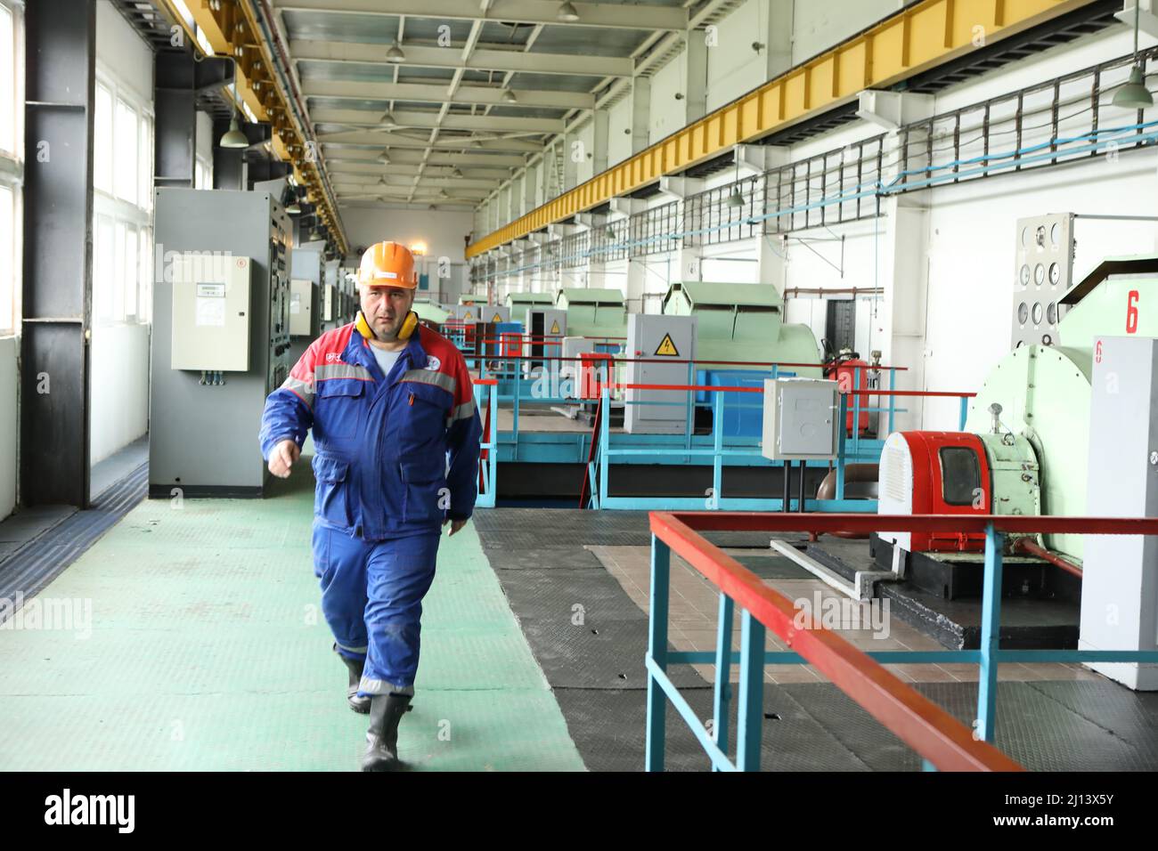 Workers at the oil and gas station. Shut off the gas, control station ...