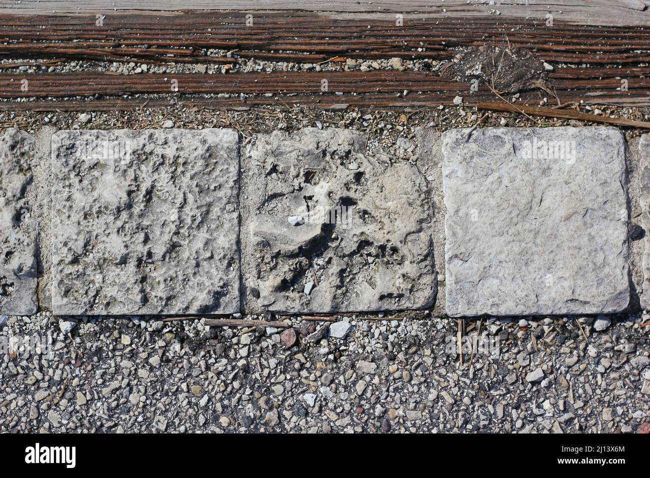 Three masonry brick stones lining the walkway Stock Photo - Alamy