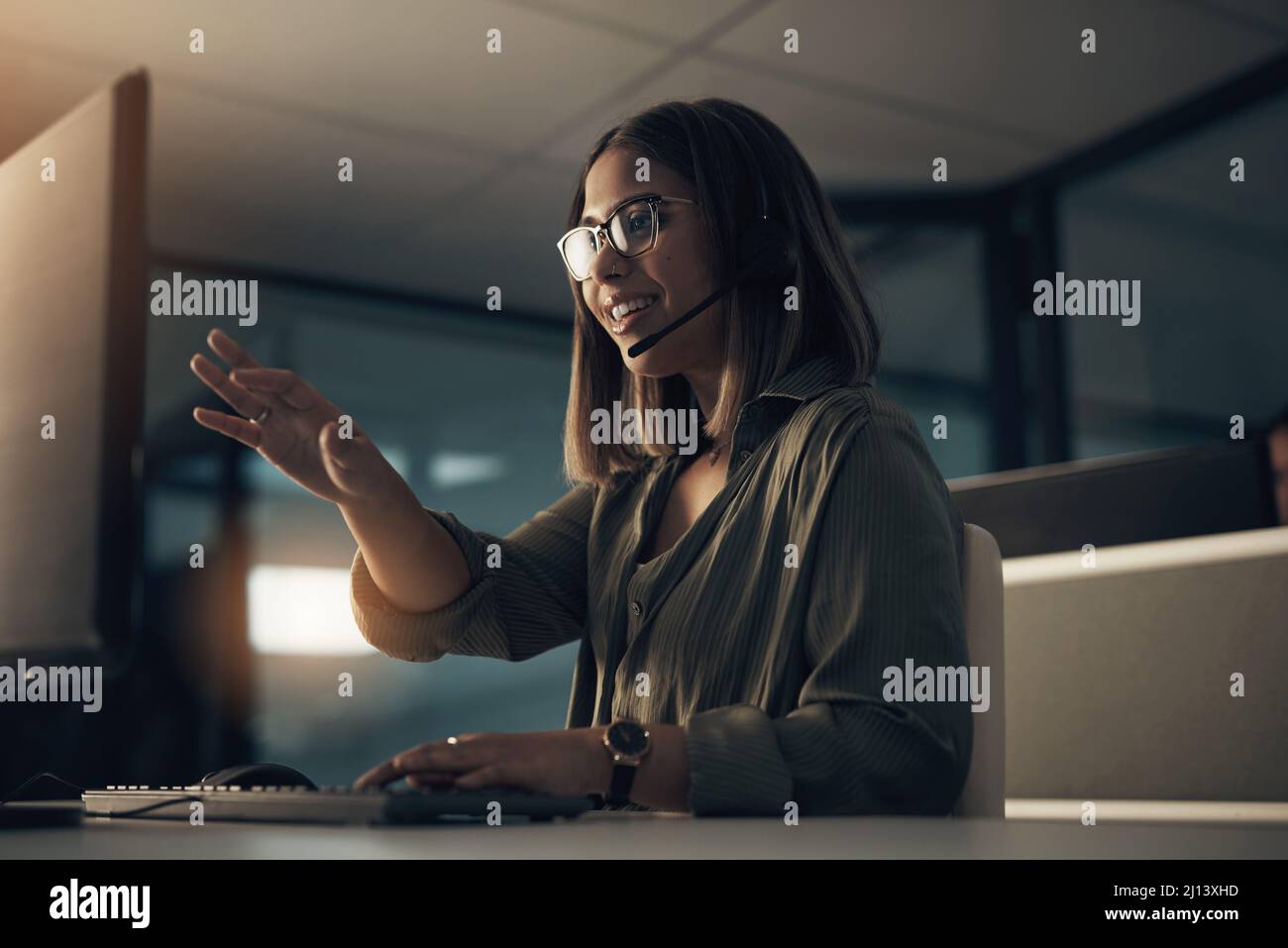 Giving clear instructions for the solutions. Shot of a call centre ...