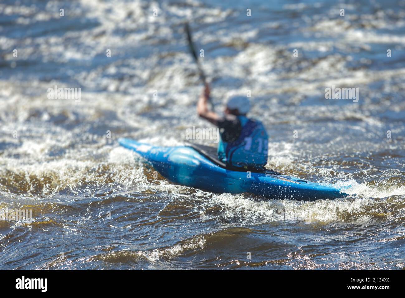 Kayak slalom canoe race in white water rapid river, process of kayaking ...