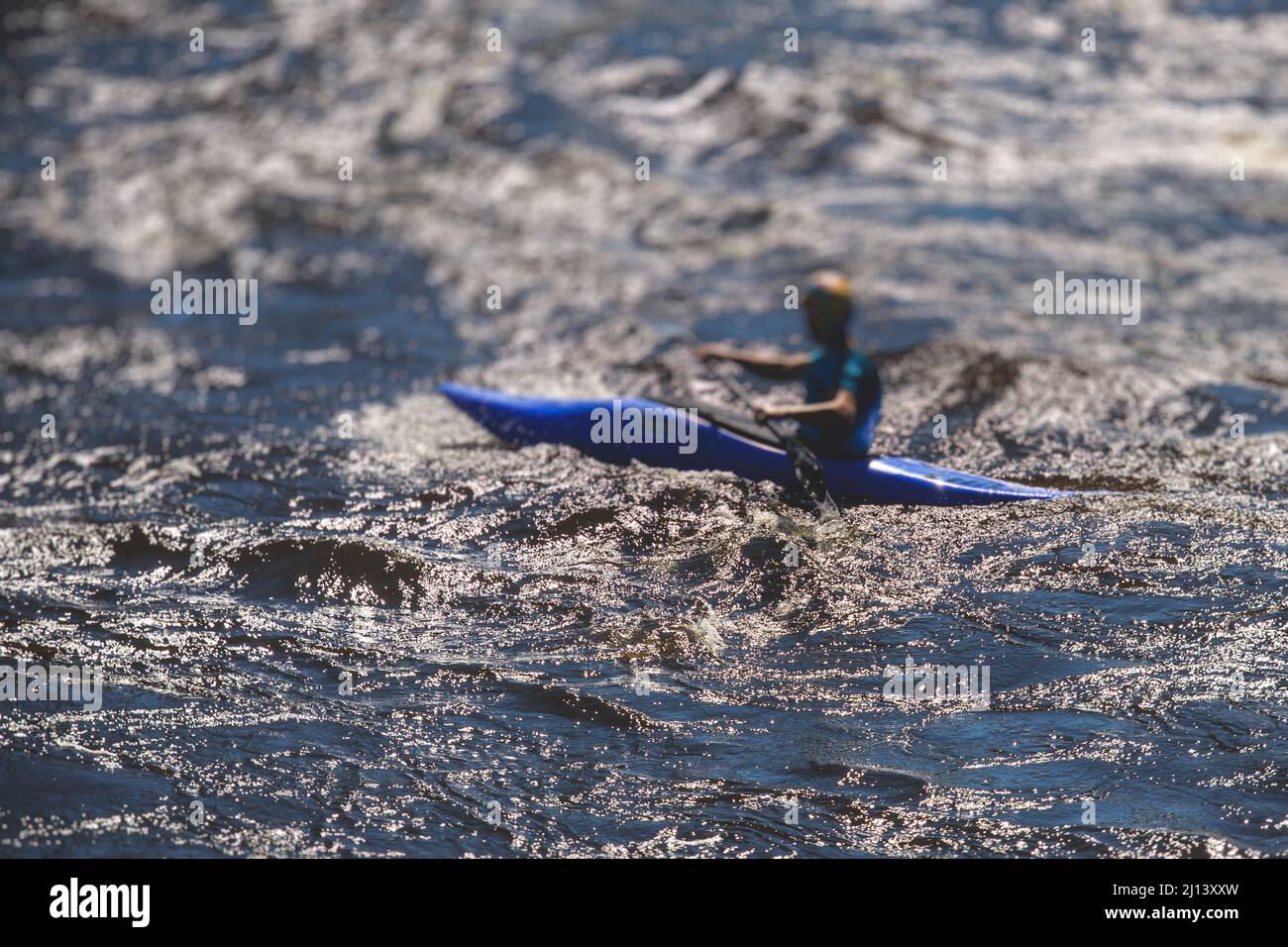 Kayak slalom canoe race in white water rapid river, process of kayaking ...